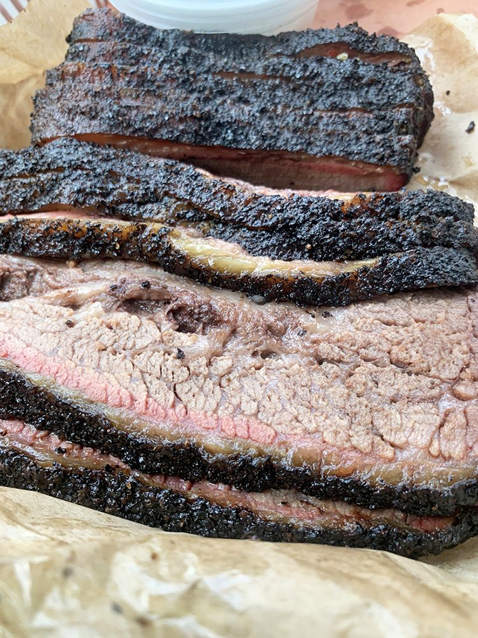 Behold the brisket in all its glory &ndash; the perfect marriage of pepper-crusted exterior and buttery interior that makes time stand still.