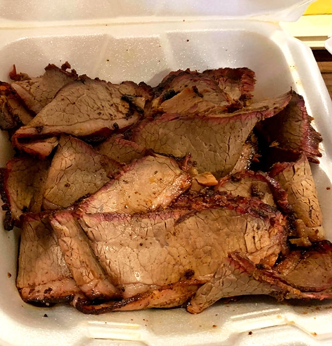 Brisket so tender it practically surrenders at the sight of your fork. That smoke ring isn't just for show&mdash;it's a flavor halo.