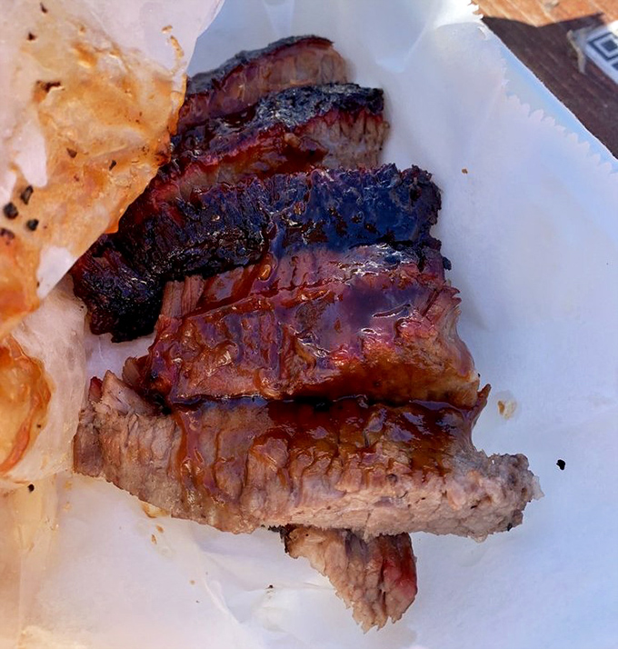 Brisket this beautiful should have its own Instagram account. The bark alone deserves a standing ovation, while that smoke ring is practically wearing a halo.