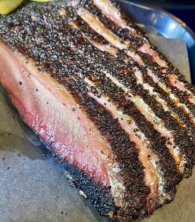 That bark! That smoke ring! This brisket has the kind of credentials that would make a Texas pitmaster tip his hat in respect.