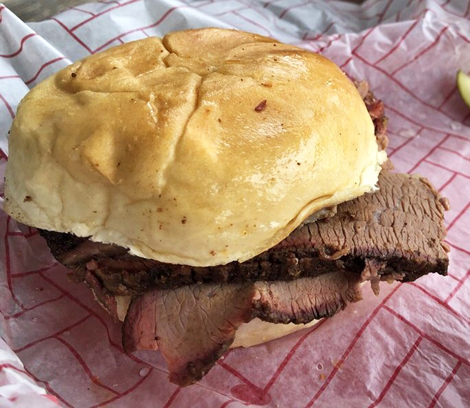 The brisket sandwich that ruins all other sandwiches. Thick-cut, smoke-ringed beef on a pillowy bun &ndash; simplicity that speaks volumes.