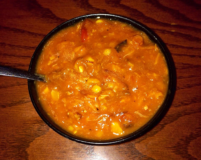 Brunswick stew that looks like Georgia sunshine in a bowl – a hearty, corn-studded tradition that's been warming Southern souls for generations.