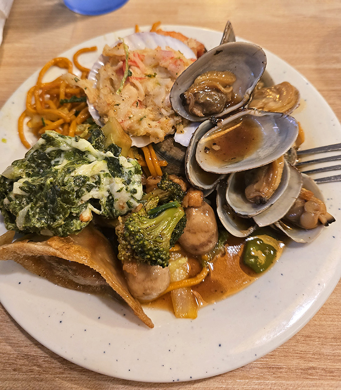 This plate tells the story of someone who approached the buffet with both strategy and ambition. A masterclass in buffet architecture.