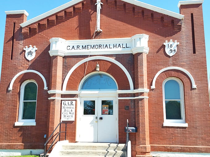 The C.A.R. Memorial Hall stands proudly with its 1893 cornerstone, proof that good architecture never needs an expiration date.