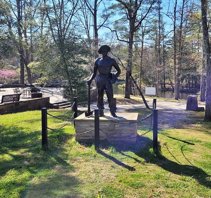 Standing tall through rain and shine, this CCC worker statue reminds us that great parks are built by even greater people.