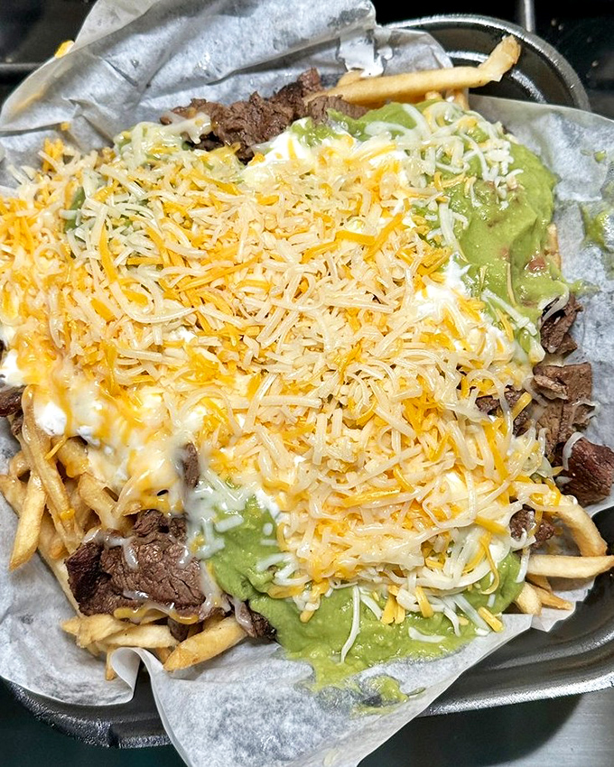 Carne asada fries: San Diego's gift to humanity. A mountain of crispy potatoes, tender steak, and cheese that makes French fries blush with inadequacy.