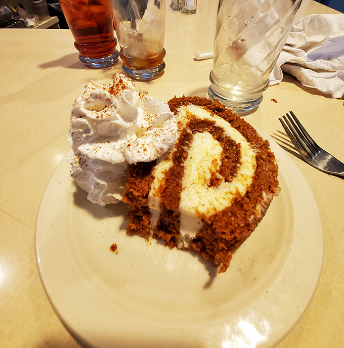This isn't just carrot cake; it's an engineering marvel of moist spiced layers and cream cheese frosting that would make architects weep with joy.