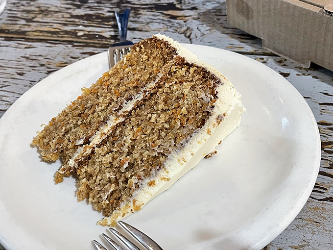 This isn't just carrot cake; it's what carrot cake dreams of becoming when it grows up. Three layers of moist perfection with cream cheese frosting that doesn't overwhelm.