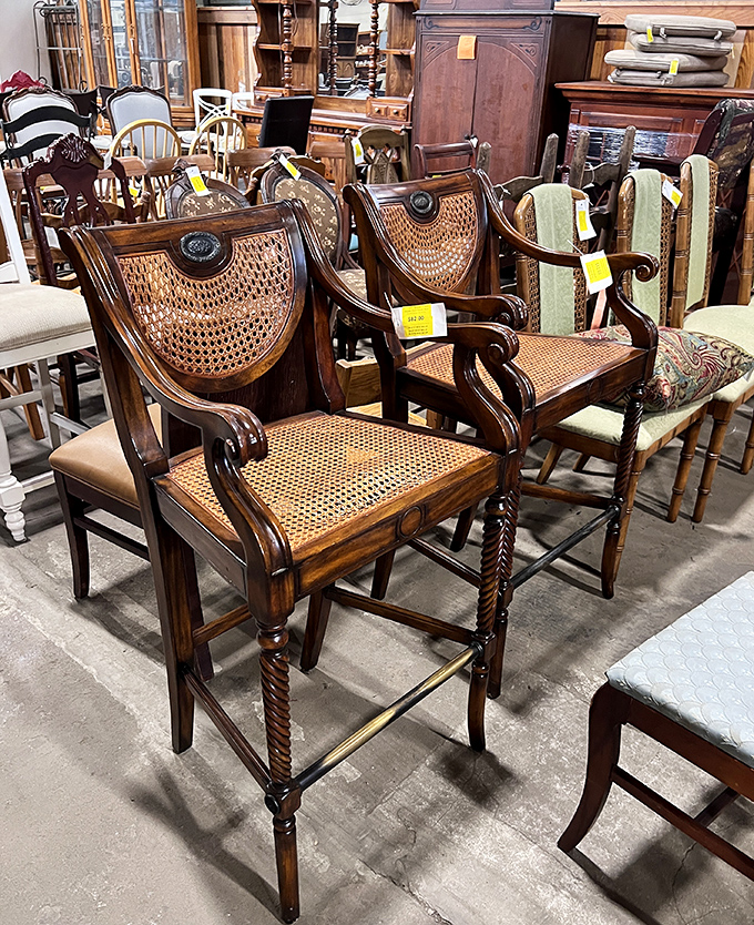 Cane-backed chairs that probably hosted more interesting dinner conversations than most modern smartphones ever will witness today.