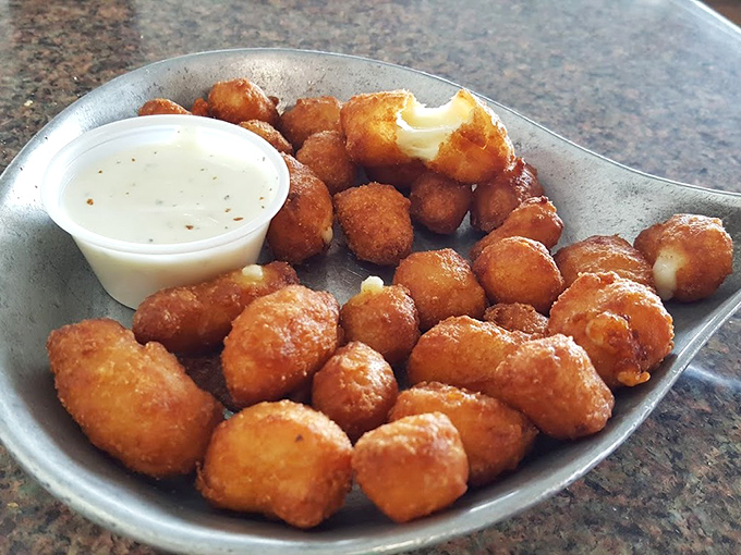 These golden cheese curds aren't just appetizers&mdash;they're little nuggets of joy that squeak between your teeth and speak directly to your soul.
