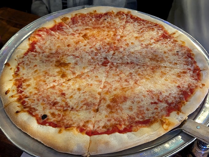 Pizza perfection doesn't need to shout. This classic cheese pie speaks volumes with its ideal sauce-to-cheese ratio and that crust worthy of frame.