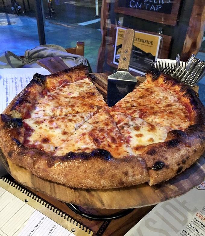 A perfect cheese pizza isn't just a meal&mdash;it's a masterpiece of simplicity. That char on the crust? That's the flavor zone calling your name.