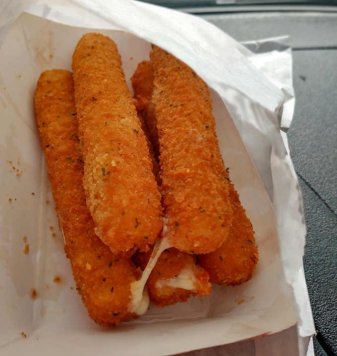 These cheese sticks aren't just appetizers; they're molten treasure chests of stretchy, gooey cheese encased in perfectly seasoned breadcrumbs &ndash; comfort food in its most dippable form.
