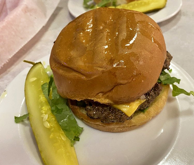 No Instagram filters needed here. Just an honest cheeseburger with a perfectly toasted bun and that distinctive flat-top sear that no fancy steakhouse can replicate.