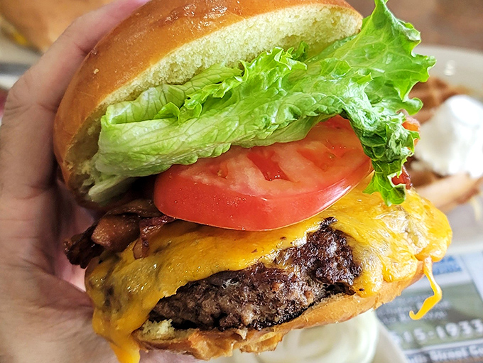 This isn't just a cheeseburger&mdash;it's edible architecture with layers of flavor that defy gravity.