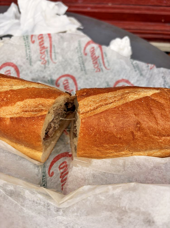 The cheesesteak in its most perfect form: crusty roll, tender meat, melty cheese. Like a warm hug from Philadelphia itself, this sandwich demands to be savored.