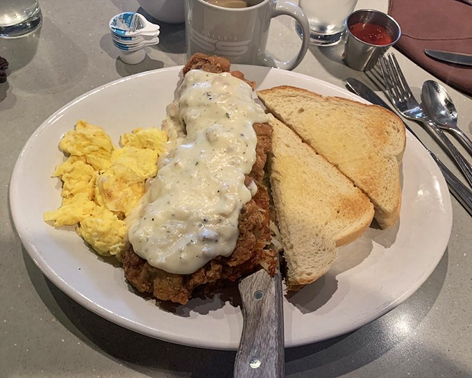 Chicken Fried Steak that's crispy enough to make Southern grandmothers nod in approval, smothered in country gravy that could solve international conflicts.