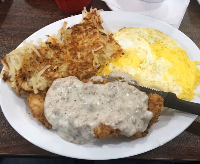 Country-fried steak with eggs and hash browns &ndash; the breakfast of champions who plan to nap by noon. Worth every delicious, indulgent bite.