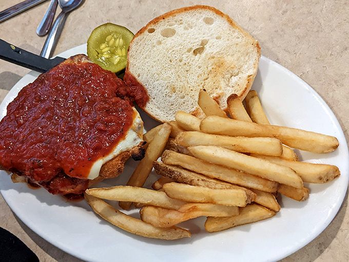 This chicken parm sandwich doesn't just satisfy hunger—it obliterates it. Crispy chicken, melty cheese, and marinara sauce create the holy trinity of sandwich perfection.