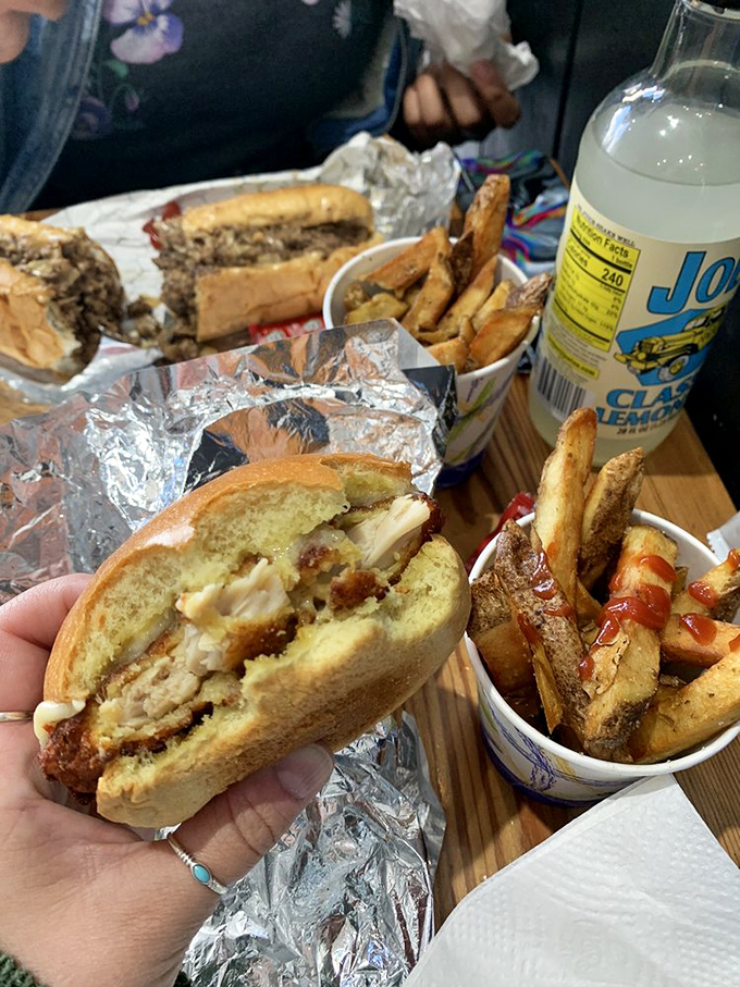 The Basil-Caper Chicken sandwich isn't playing second fiddle to anyone. That lemon aioli and those roasted tomatoes create a Mediterranean symphony in your mouth.