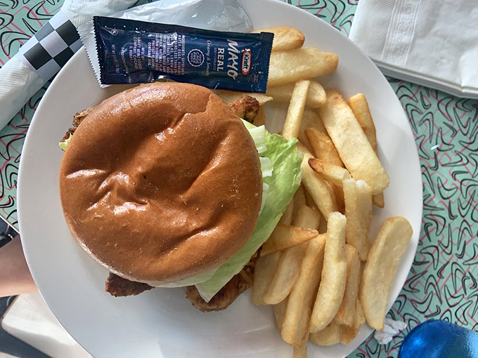 This burger arrives looking like it stepped out of a Norman Rockwell painting, only juicier.