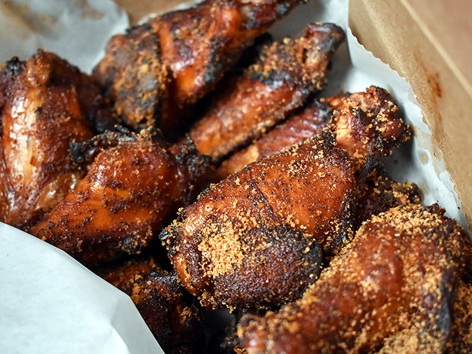 Golden, crispy, and generously coated wings that make you reconsider your definition of finger food perfection.