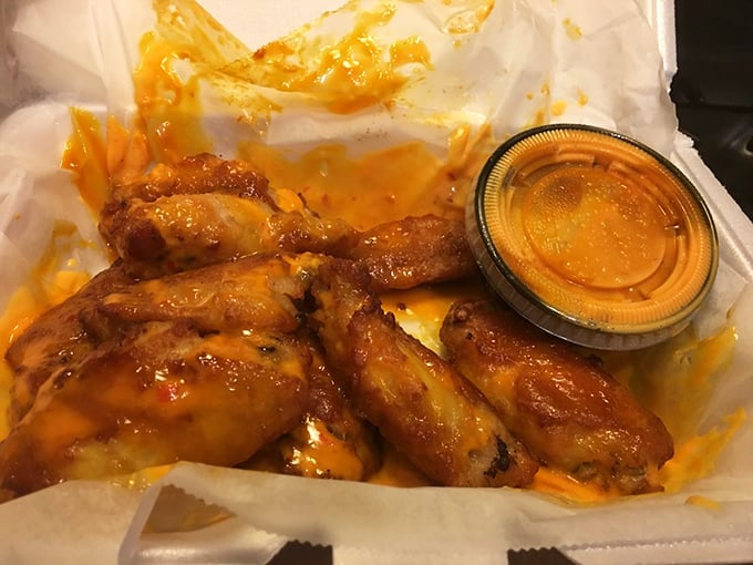 These golden-hued wings aren't just an afterthought&mdash;they're serious contenders that might make you temporarily forget you came for pizza.