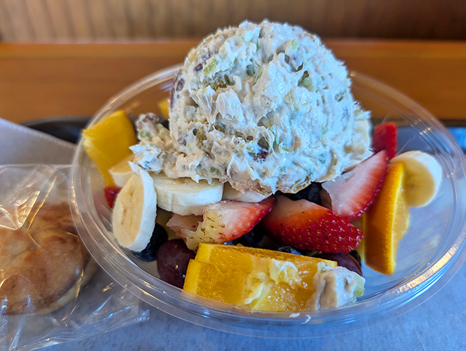A fruit salad that doesn't apologize for being healthy. Fresh ingredients crowned with a scoop of ice cream &ndash; balance achieved!