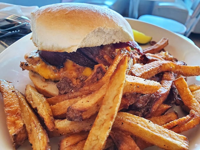 A sandwich that requires both hands and possibly a nap afterward. Those fries aren't a side dish&mdash;they're co-stars in this delicious production.