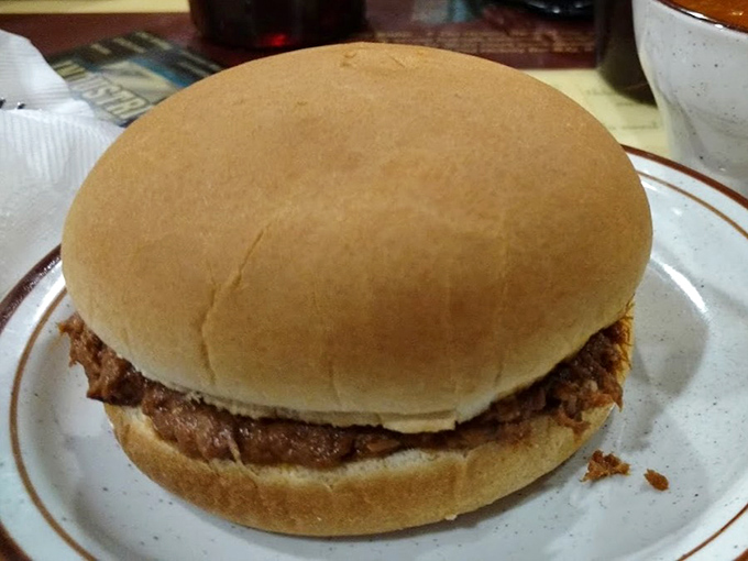 Chopped mutton on white bread is Owensboro's love language, simple and smoky and utterly uncompromising in its regional pride.