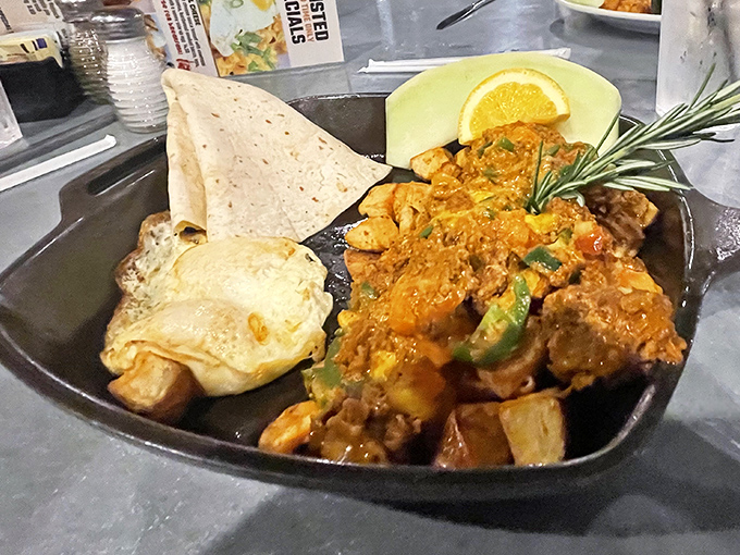 This skillet could feed a farmhand after plowing ten acres. The chorizo hash arrives with enough protein and carbs to fuel your entire vacation.