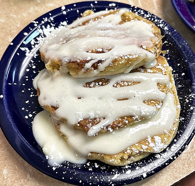 When regular pancakes aren't enough, someone brilliantly decided cinnamon rolls should get flat and syrupy—genius prevails.