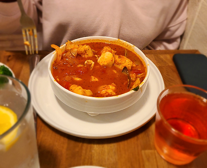 The Cioppino looks like the Pacific Ocean decided to throw a party and invited only its most delicious residents. Spoons up!