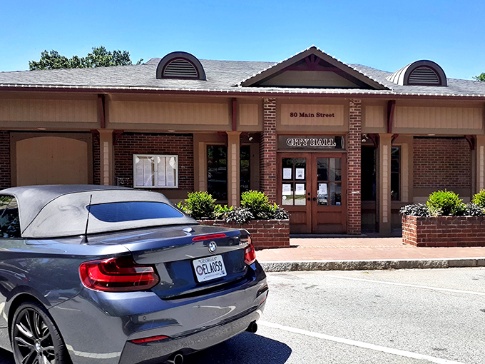 Senoia's City Hall embodies small-town governance at its most approachable—a brick building where decisions are made with a neighborly handshake rather than bureaucratic red tape.