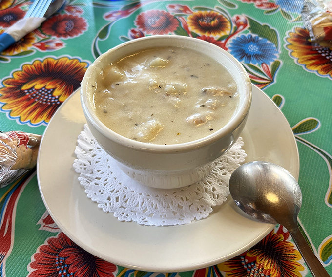 Clam chowder so creamy it should have its own fan club. Served on a doily because even comfort food deserves a proper introduction.
