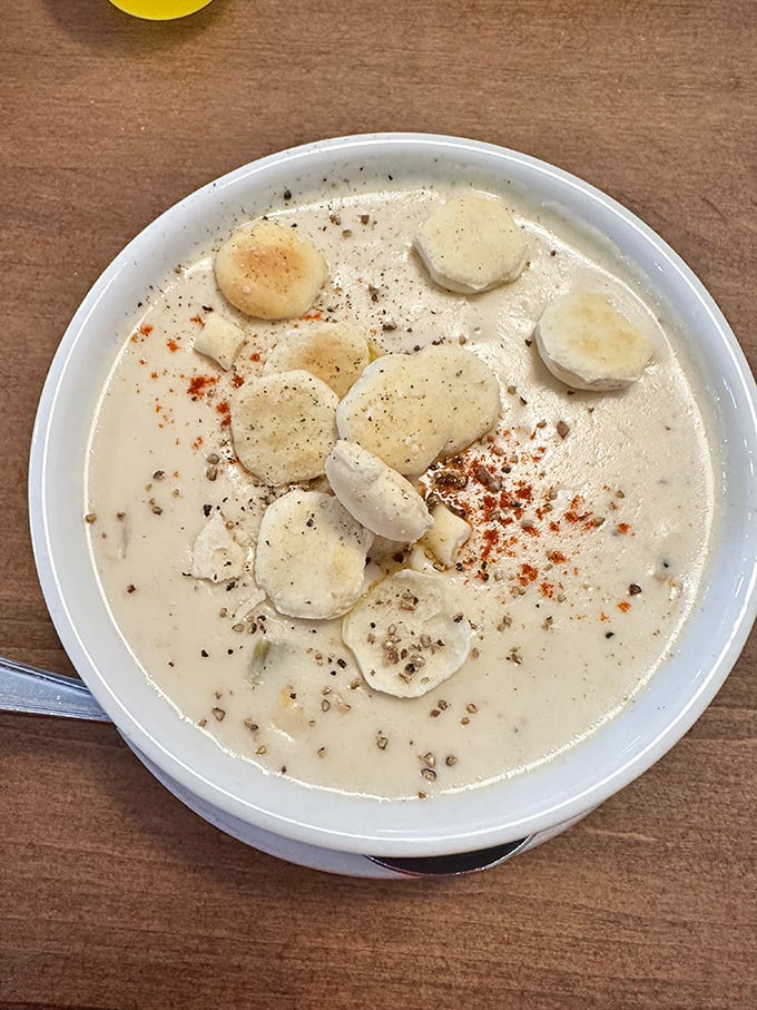 This isn't just clam chowder; it's a creamy ocean hug in a bowl. Those tender scallops floating like delicious little life preservers make resistance futile.