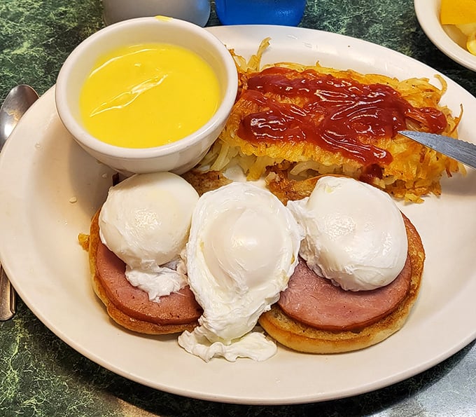 Three poached eggs doing synchronized swimming in hollandaise &ndash; the Olympics of breakfast right here.