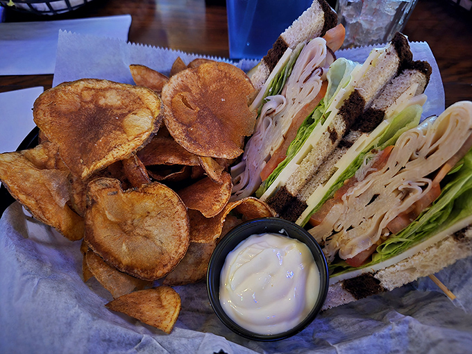 The club sandwich arrives with kettle chips that aren't just along for the ride &ndash; they're co-stars in this lunchtime blockbuster.