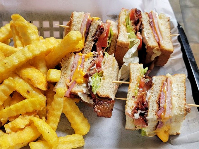 Club sandwiches are the architectural marvels of the sandwich world, and this triple-decker beauty has the structural integrity engineers dream about.