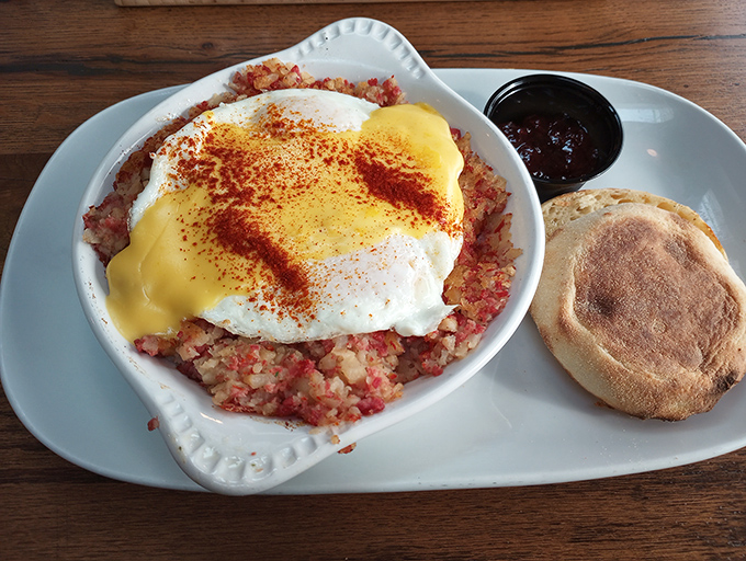 Corned beef hash with eggs that would make your grandmother both jealous and proud. That golden yolk is about to create breakfast magic.