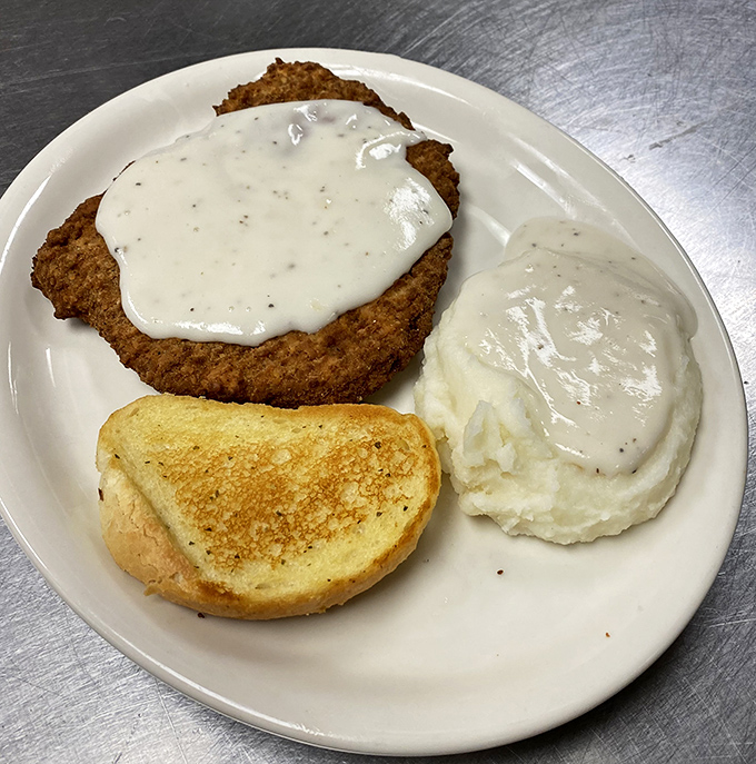 Country fried steak smothered in peppery gravy&mdash;comfort food that gives you a warm hug from the inside out.
