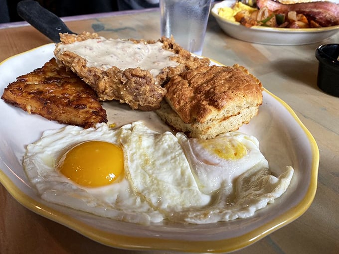 Biscuits and gravy, sunny-side-up eggs, and a golden hash brown&mdash;the holy trinity of breakfast that proves comfort food needs no translation.
