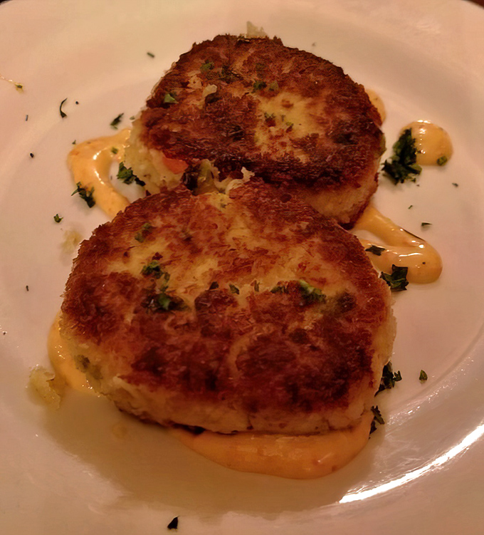 Golden-brown crab cakes that make you wonder if the chef has secret family connections to Maryland's Chesapeake Bay.