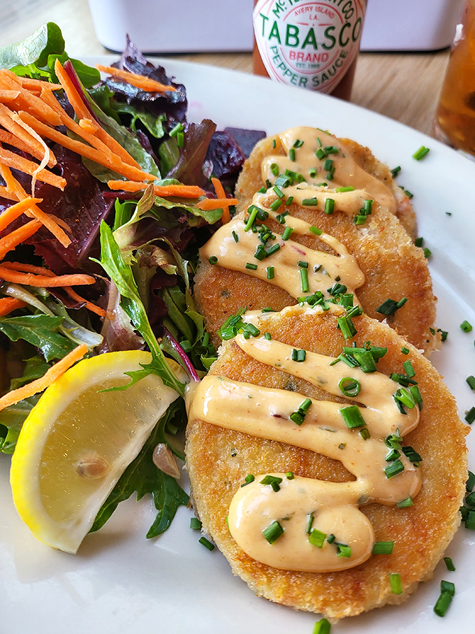 These golden crab cakes aren't just dinner&mdash;they're an event. Crispy exterior, tender interior, and that remoulade sauce? Someone should write sonnets about it.