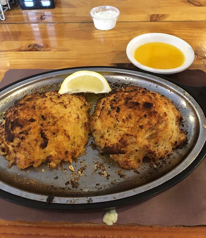 These golden-brown crab cakes aren't trying to impress anyone with fancy presentation – they're too busy being absolutely delicious.