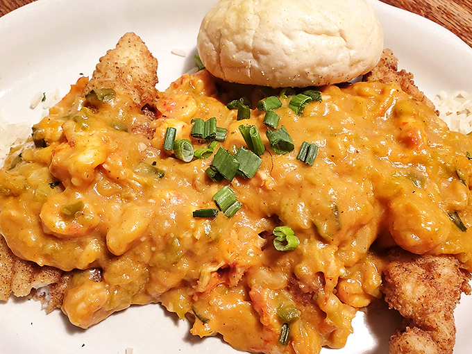 The crawfish &eacute;touff&eacute;e arrives like a golden sunset on a plate, each spoonful delivering that slow-building heat that makes Louisiana cuisine legendary.