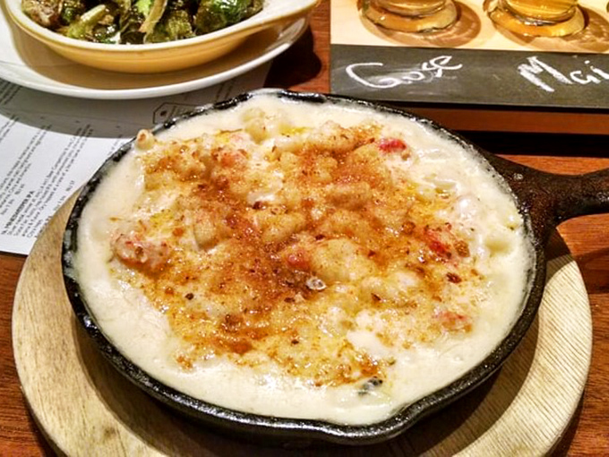 Mac and cheese that's had a glow-up worthy of a Hollywood makeover. The golden crust hides a creamy interior that would make even a French chef nod in approval.