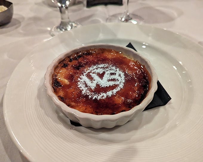 The cr&egrave;me br&ucirc;l&eacute;e arrives with that signature "WB" dusted on top &ndash; crack through that caramelized sugar ceiling to creamy paradise below.