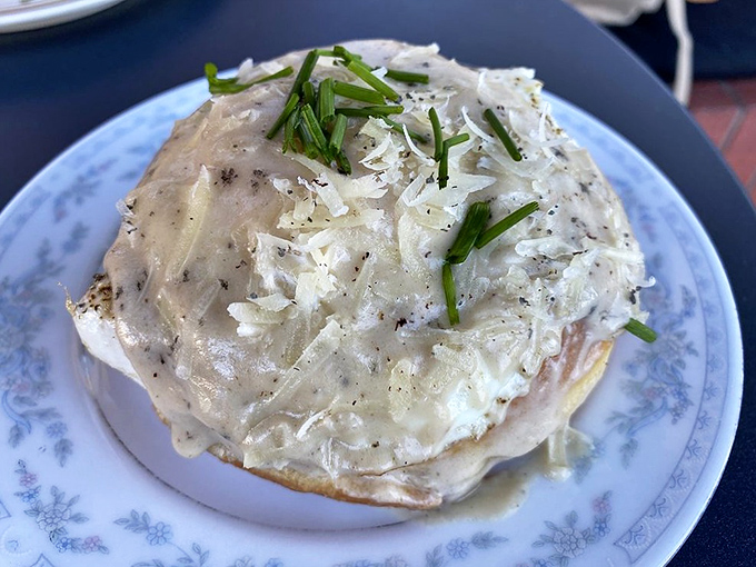 This savory masterpiece isn't just a donut – it's a full-fledged brunch rebellion topped with chives and cheese that makes breakfast jealous.