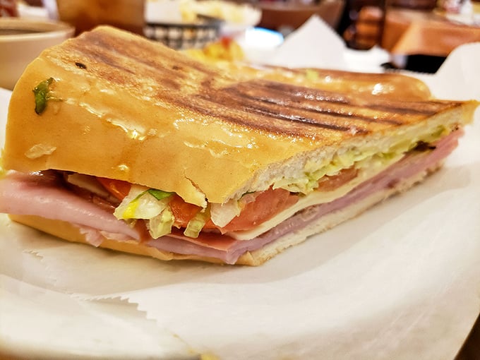 The Cuban sandwich at El Siboney is architectural perfection&mdash;layers of ham, roast pork, cheese, and pickles pressed between bread that's both crisp and yielding.